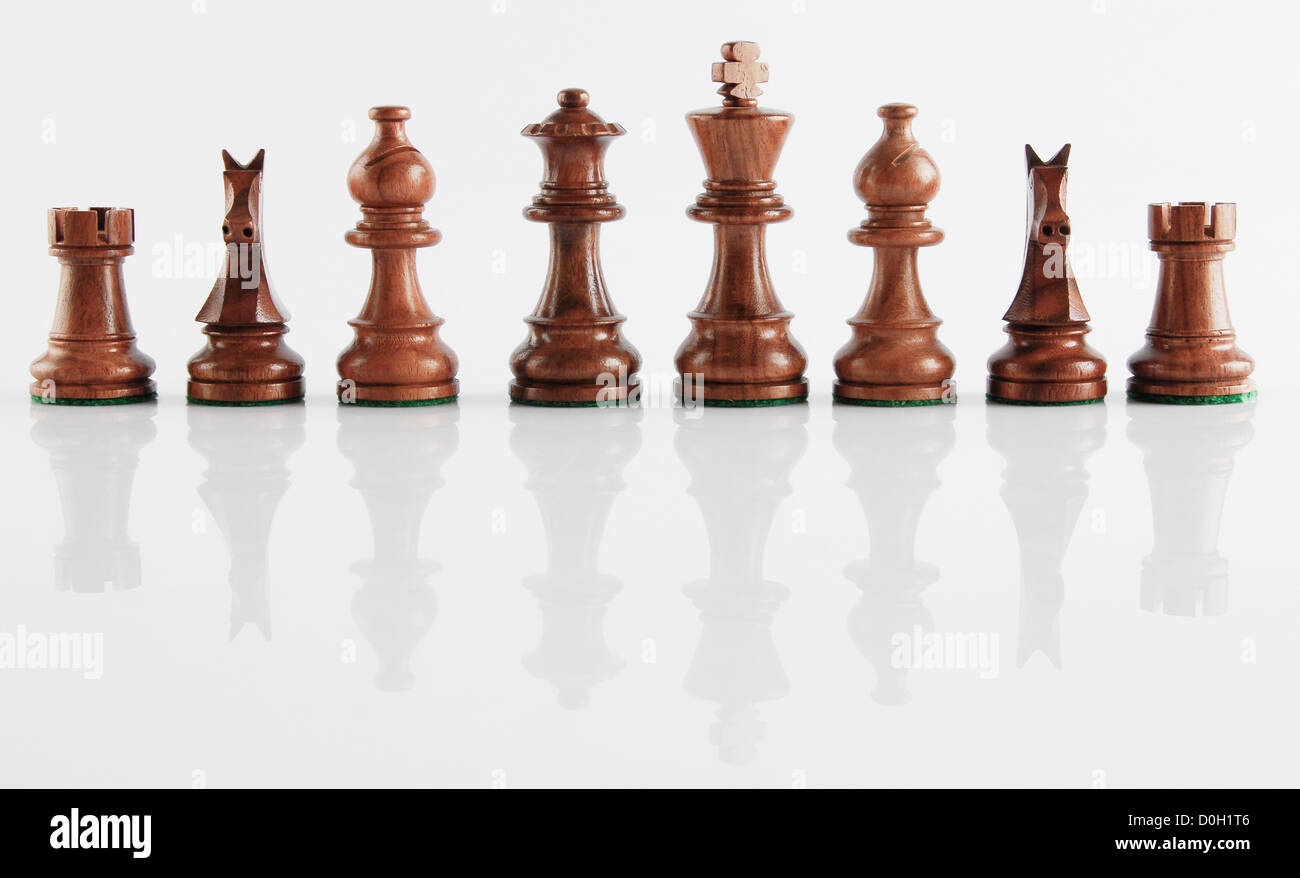 Chess pieces in a row Stock Photo - Alamy