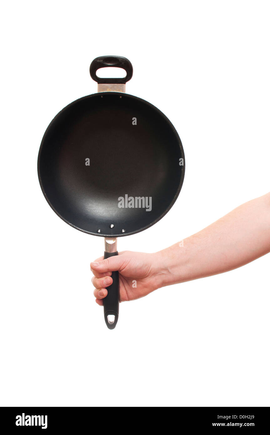 Hand holding black frying hi-res stock photography and images - Alamy