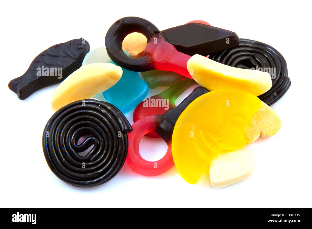 Pile of candy with dutch sweets isolated over white Stock Photo - Alamy