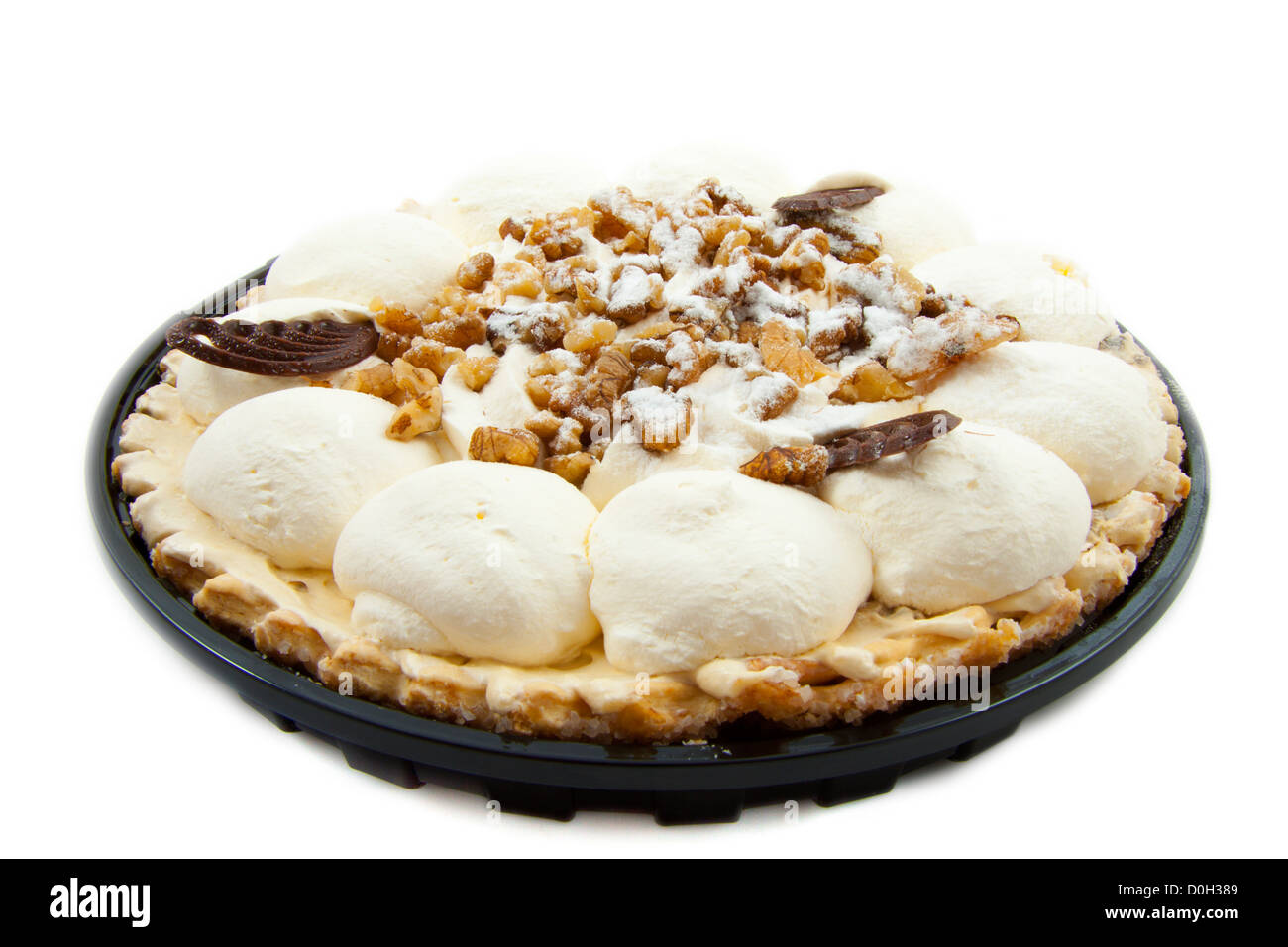 Plate with nut pie isolated over white Stock Photo - Alamy