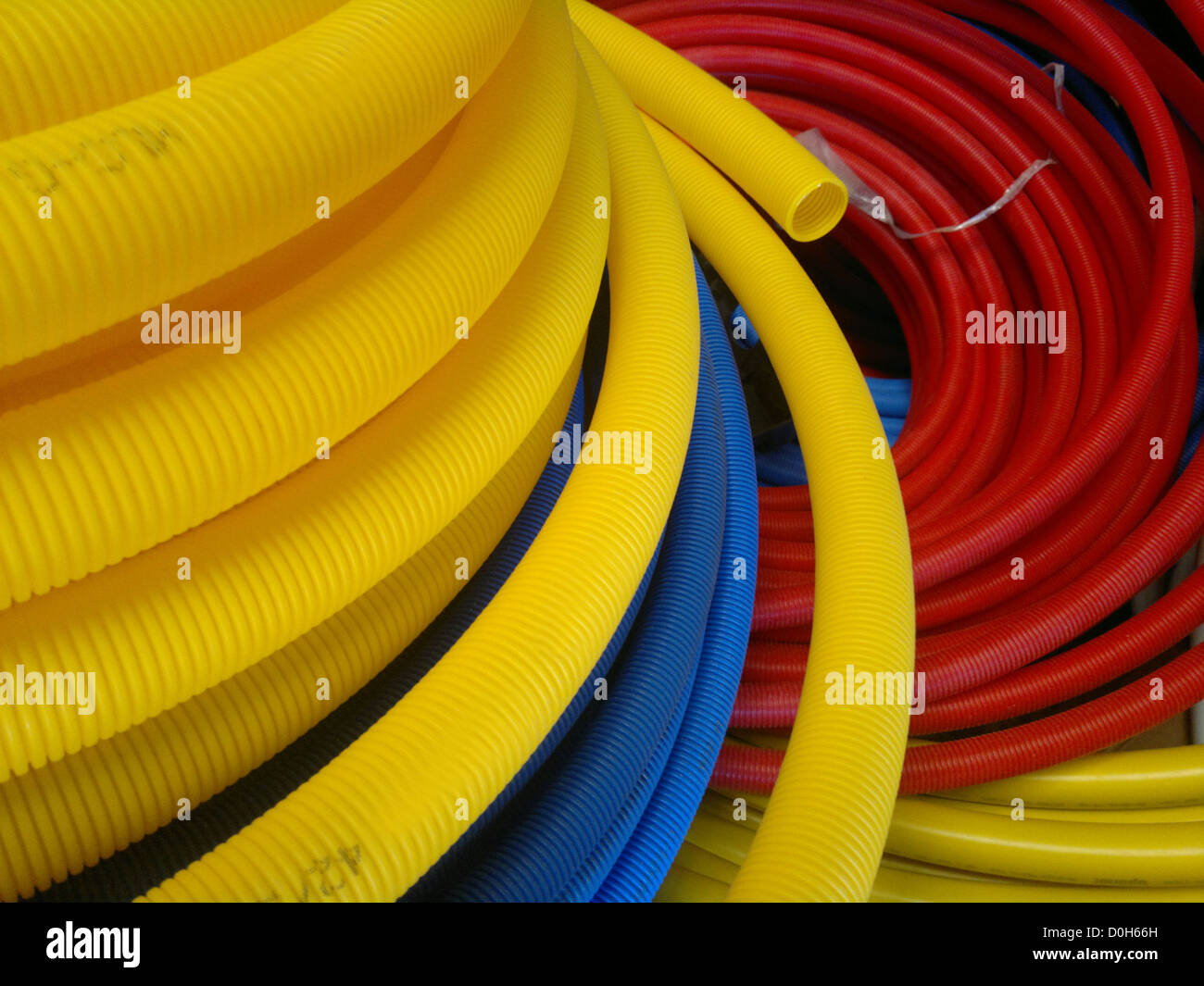 Colorful hose on a pile in three types Stock Photo - Alamy