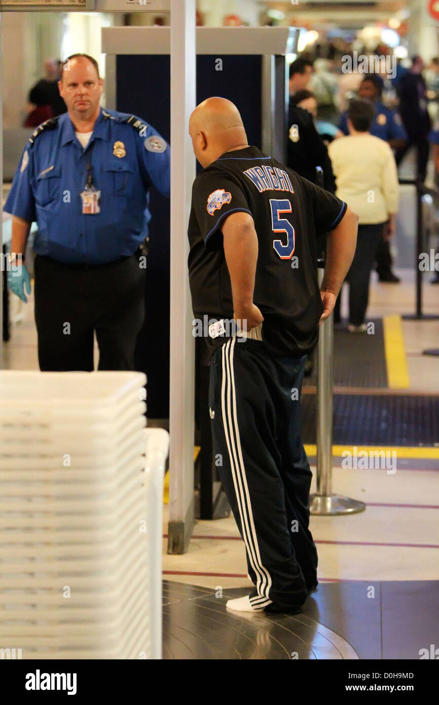 Going through airport security hi-res stock photography and images - Alamy