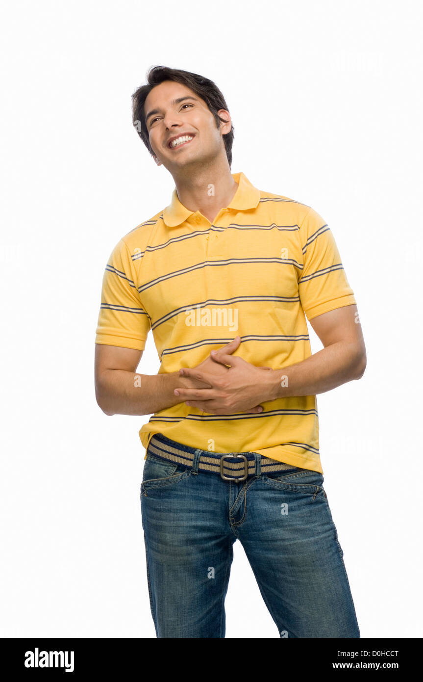 Young male fashion model laughing Stock Photo - Alamy