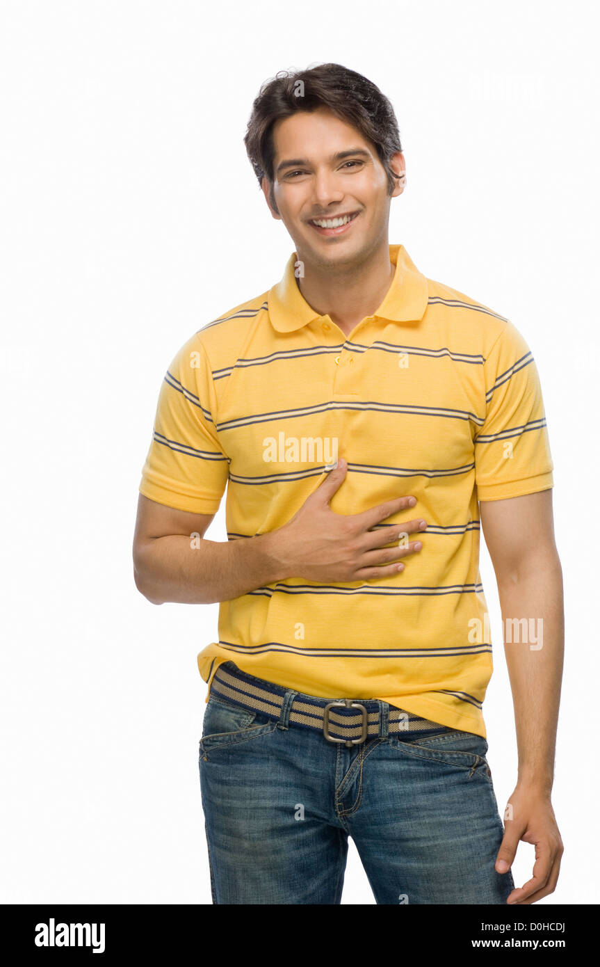 Portrait of a young male fashion model smiling Stock Photo - Alamy