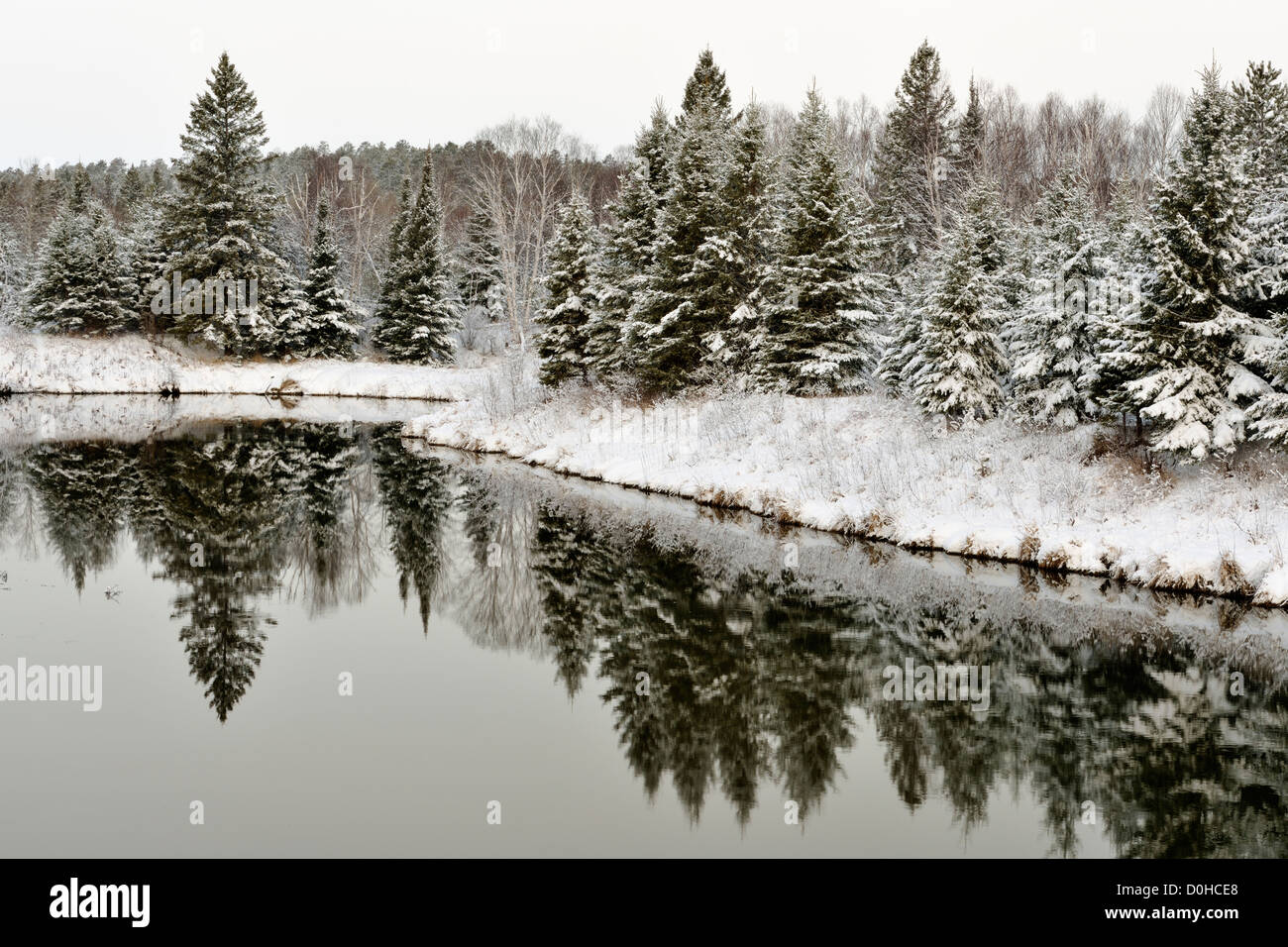 Fresh snow and open water along Junction Creek after a spring blizzard ...