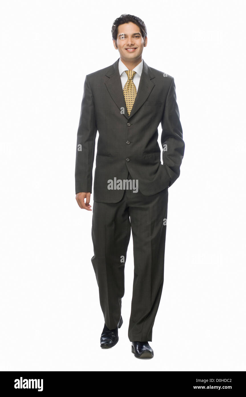 Portrait of a businessman standing against a white background Stock ...