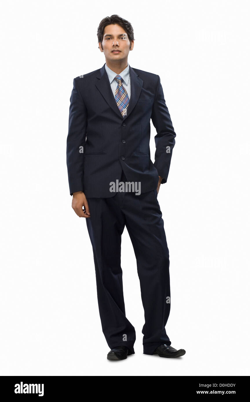 Portrait of a businessman standing against a white background Stock ...