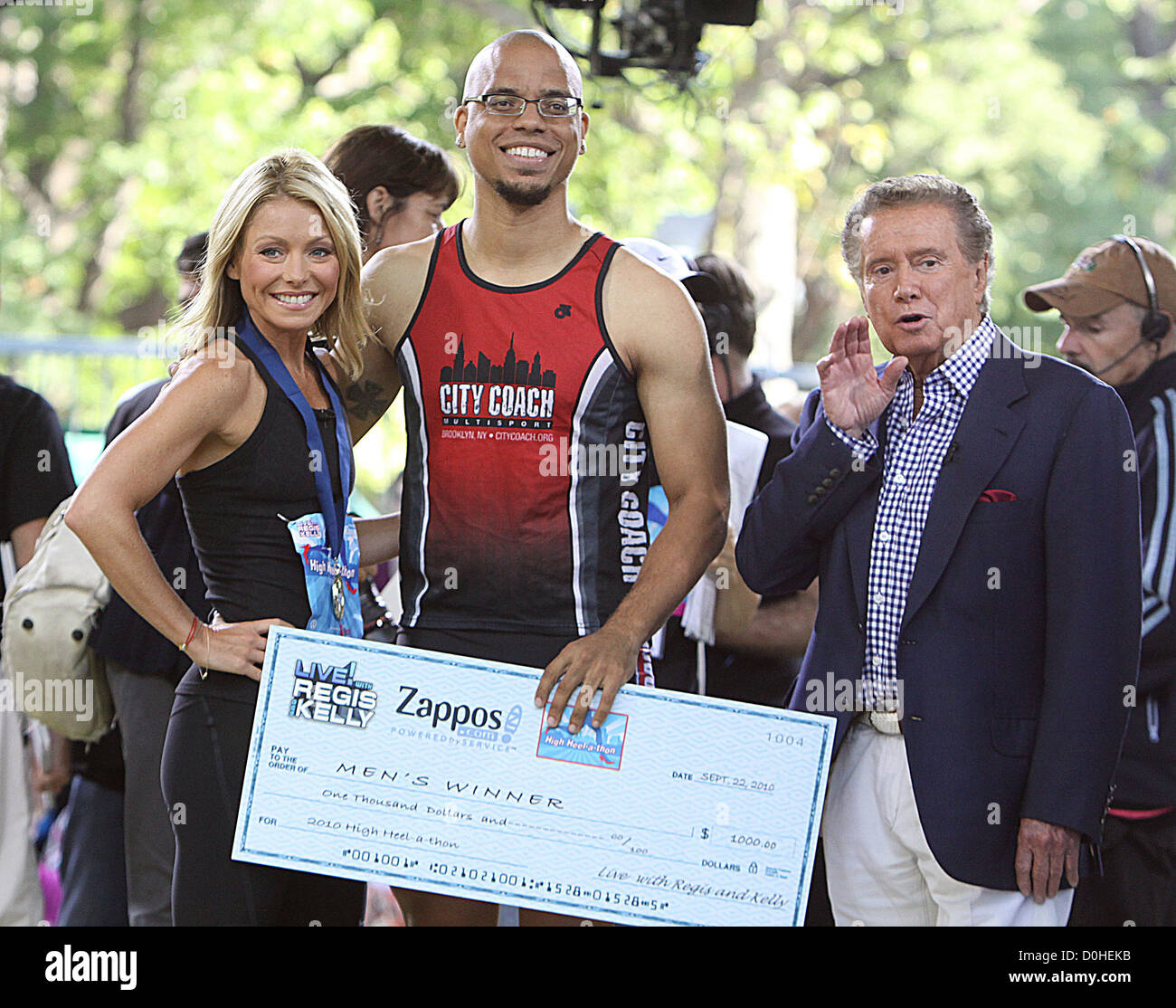 Kelly Ripa, Regis Philbin, and the winner Shane Neil for the male run ...