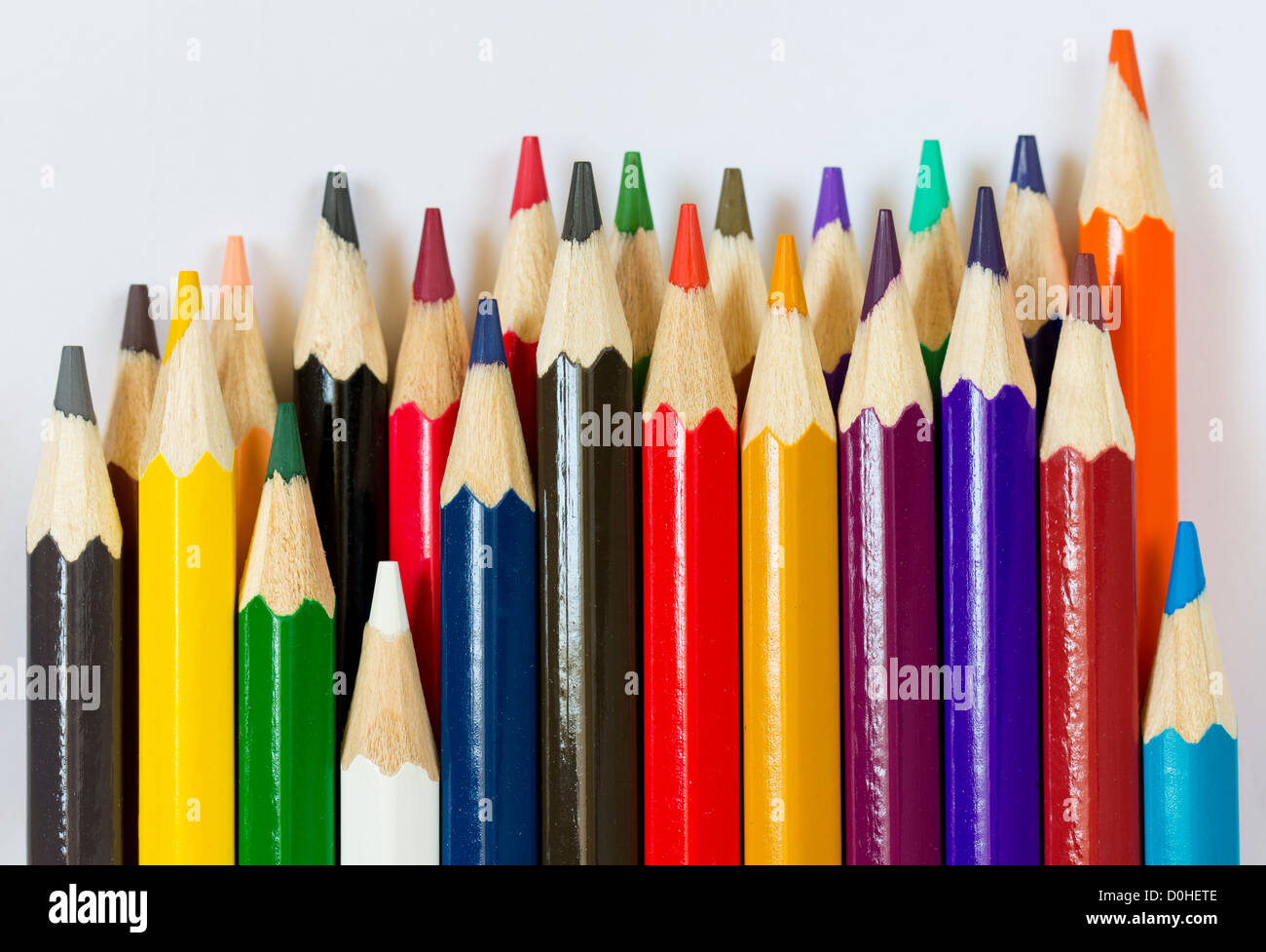 Colored pencils on a light background Stock Photo - Alamy