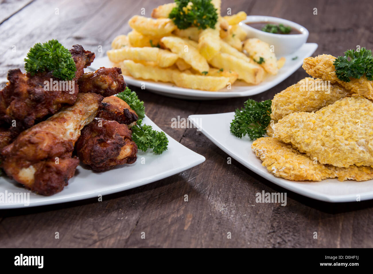 Fingerfood on a plate (wooden background Stock Photo - Alamy