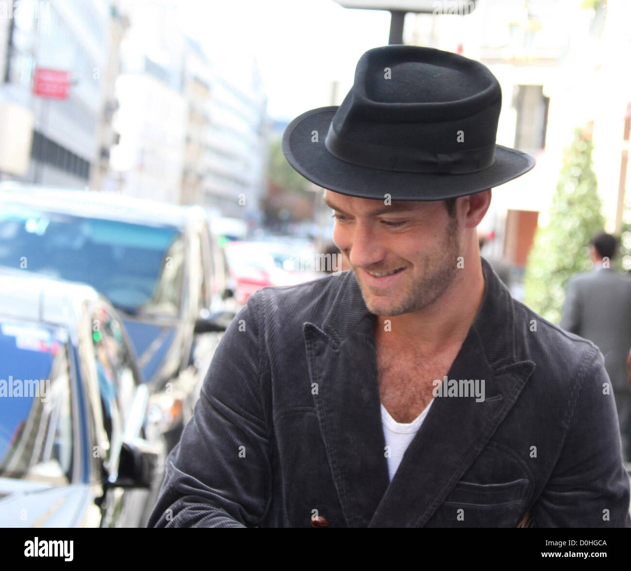 Jude Law leaves the Bristol Hotel and heads for the 'Peace One Day ...