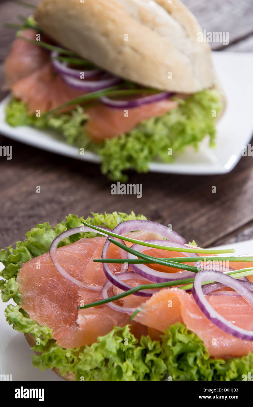 Smoked Salmon with lettuce on a bun Stock Photo - Alamy