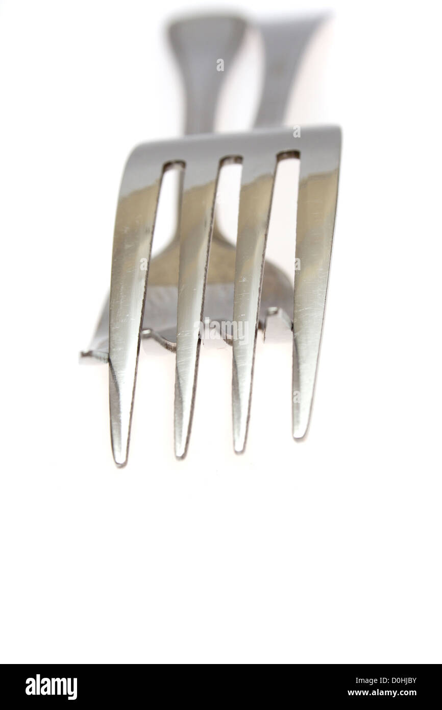 two forks photo on the white background Stock Photo - Alamy