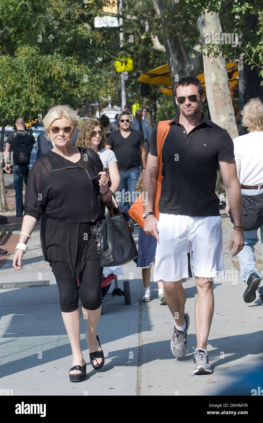Hugh Jackman and Deborra-Lee Furness walking home with their daughter ...