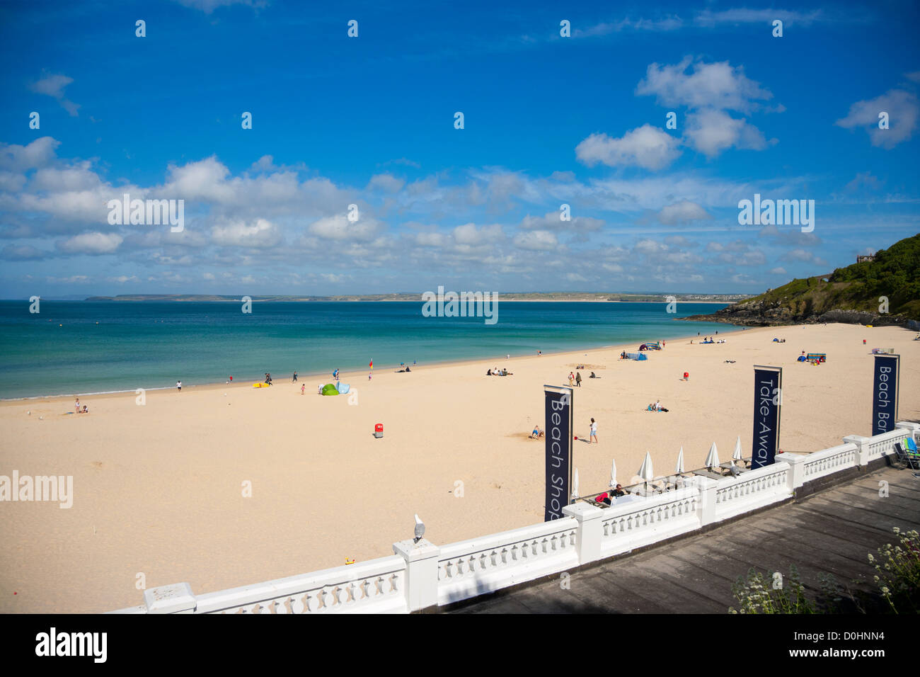 A view of the harbour beach at St Ives with the tide in on a sunny ...