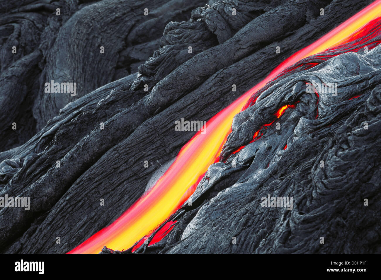 A River of Glowing Hot Pahoehoe Lava Flowing Near Cooled Rope-Like ...
