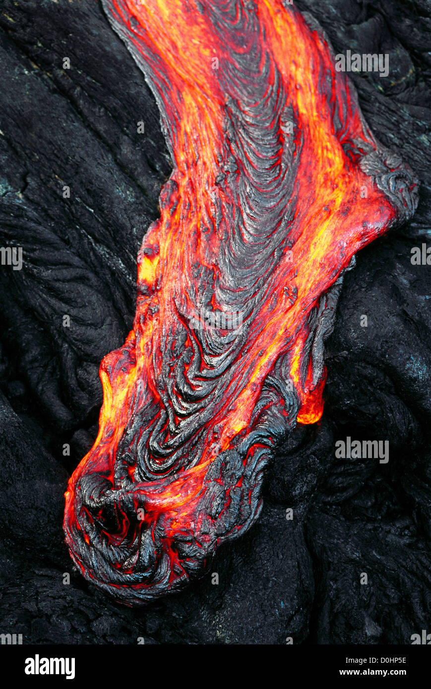 A Stream of Glowing Hot Pahoehoe Lava Oozing Over a Ledge Stock Photo ...