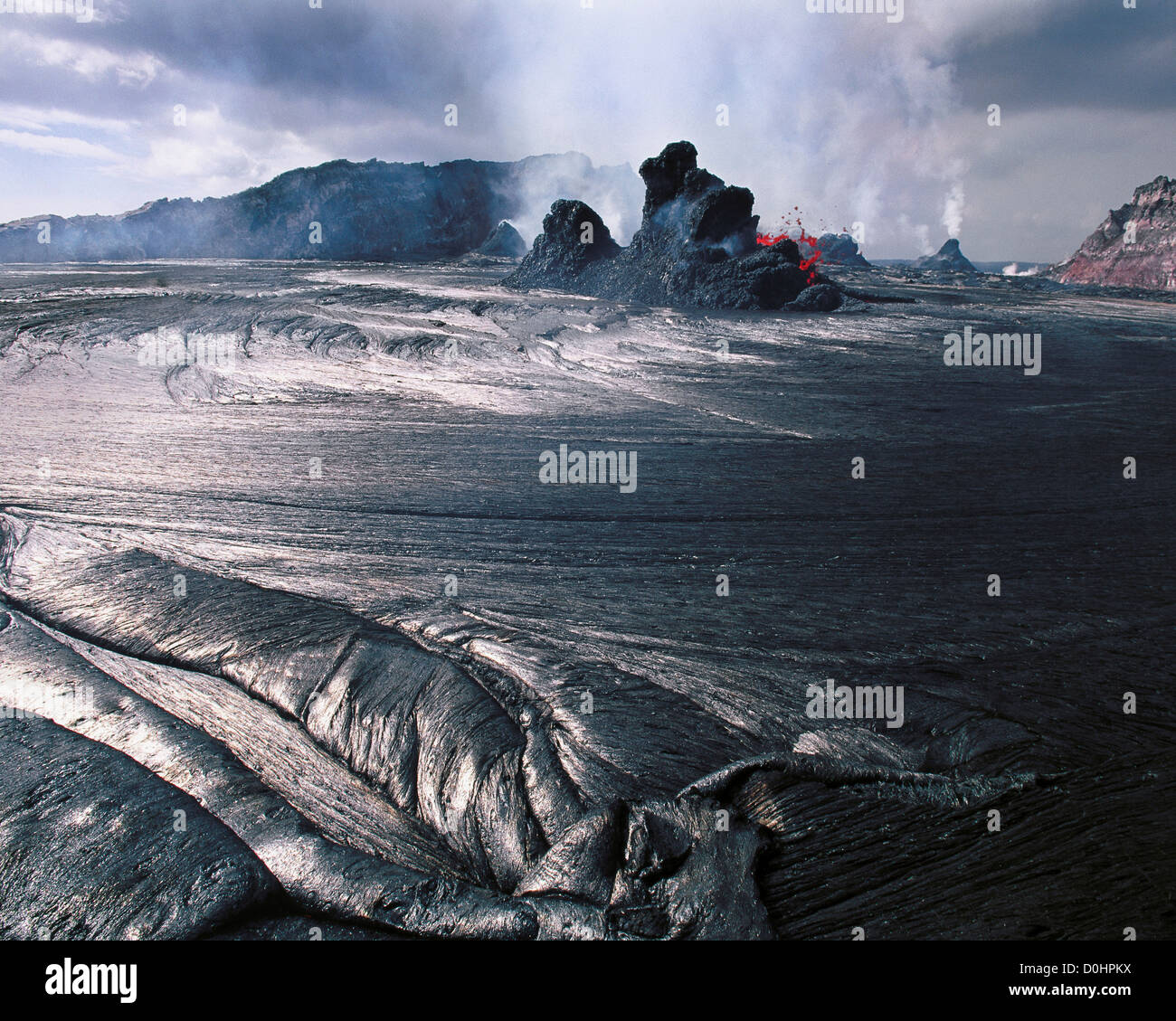 Lava Flowing Out of a Lake of Lava at Kupianaha Vent Stock Photo - Alamy