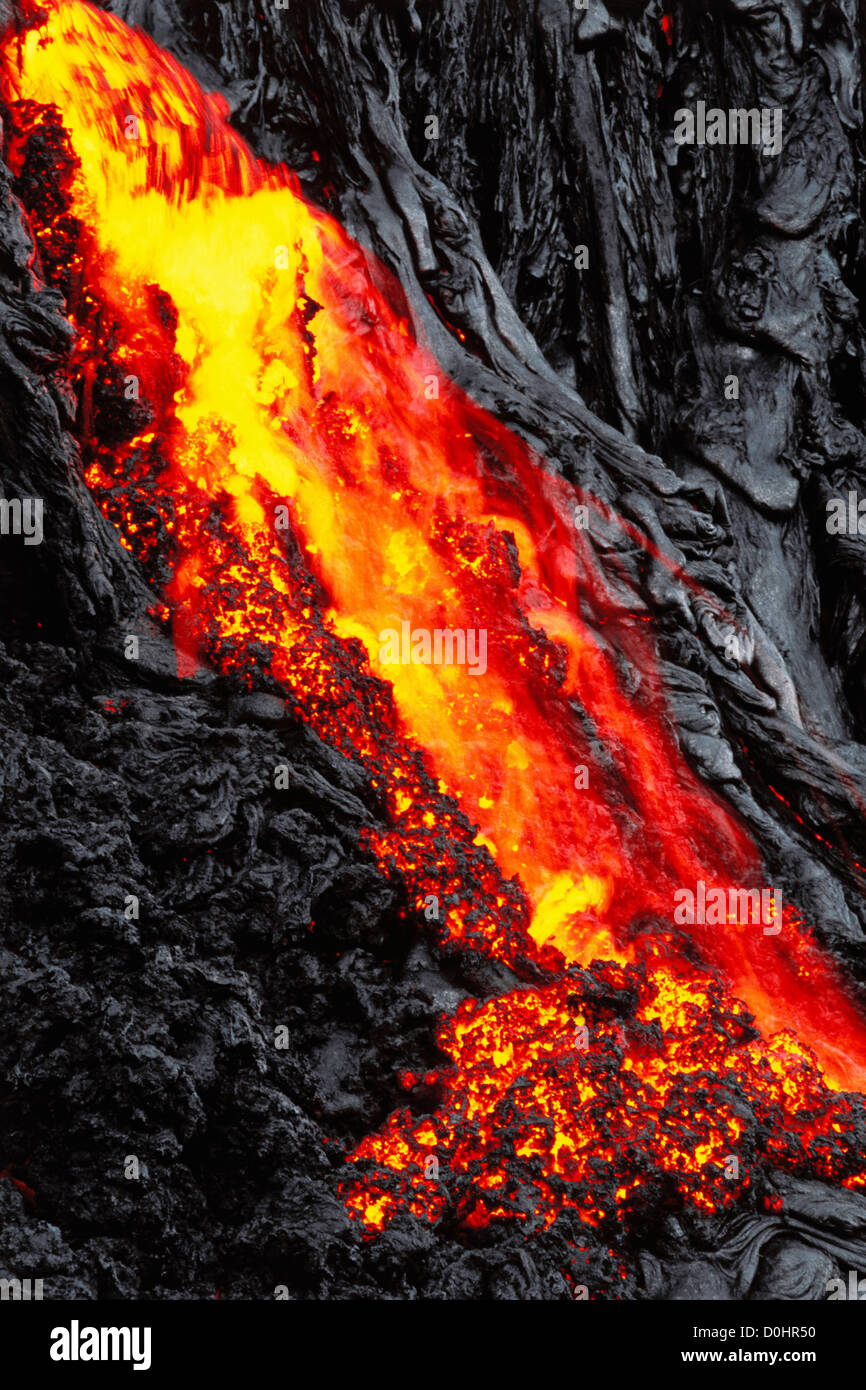 Lava Flowing Over a Sea Cliff Stock Photo - Alamy