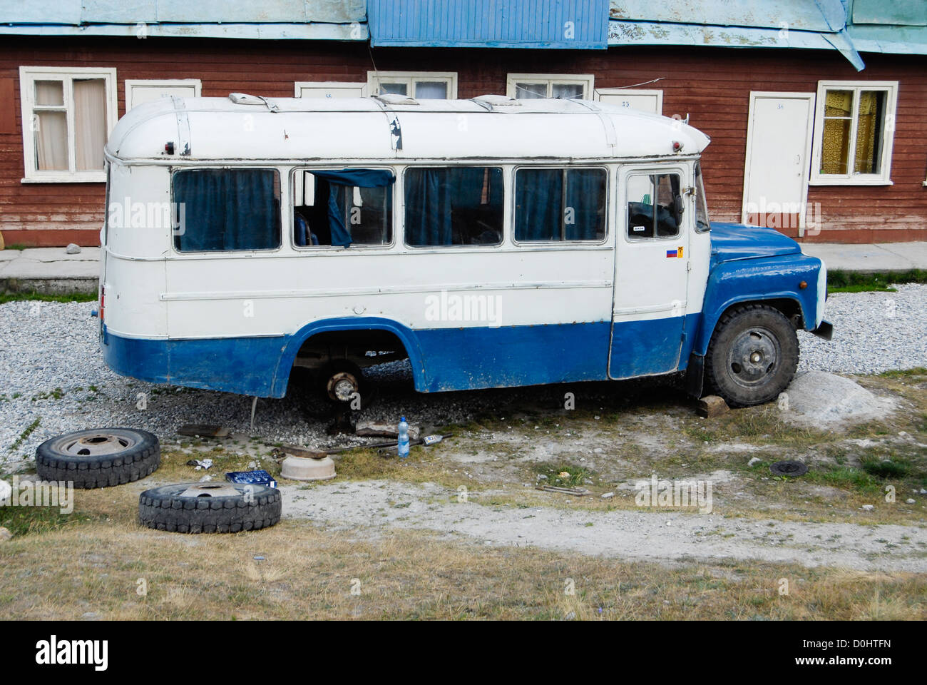 bus wheel repair old crappy blue white vehicle shuttle transport Stock ...