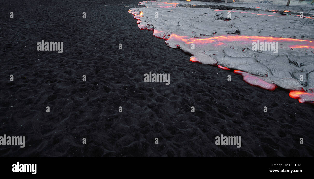 Pahoehoe Lava Covers a Black Sand Beach Stock Photo - Alamy