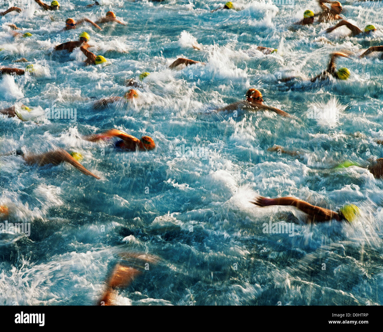 Swimmers in a Triathlon Stock Photo - Alamy