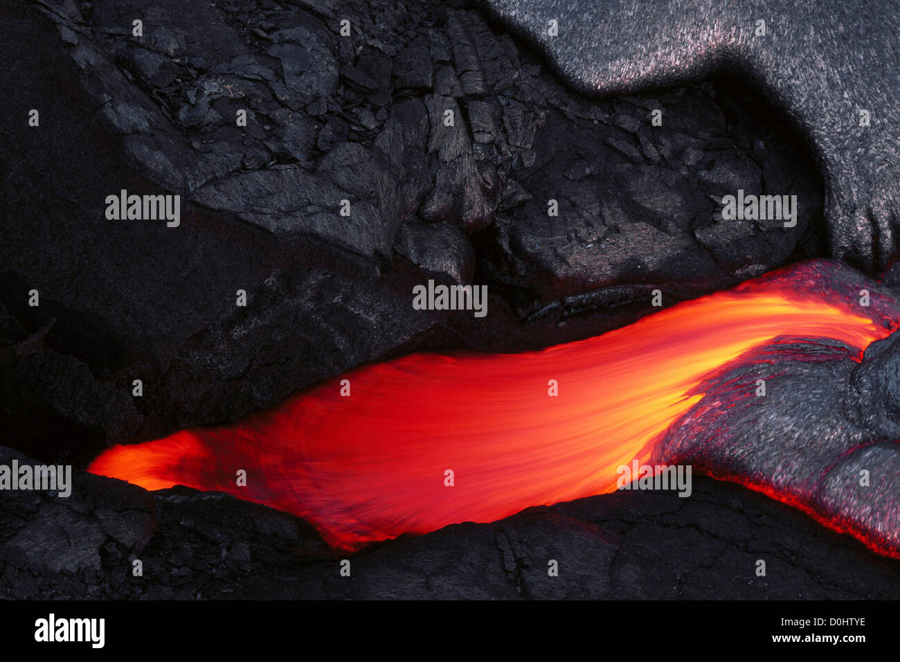 Hot Pahoehoe Lava Flowing in a Lava Stream Stock Photo - Alamy