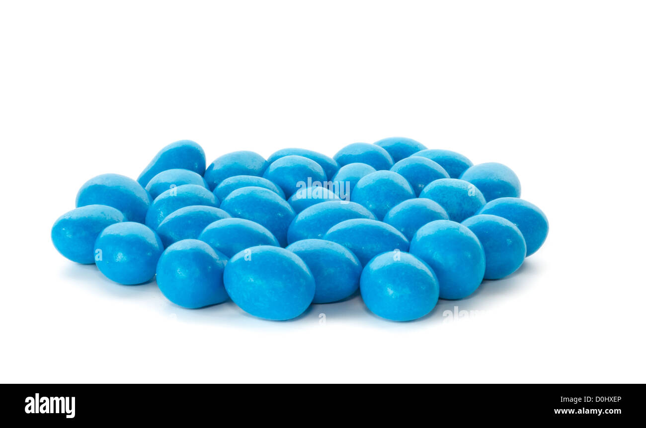 Bunch of blue chocolate sweets against white background Stock Photo - Alamy