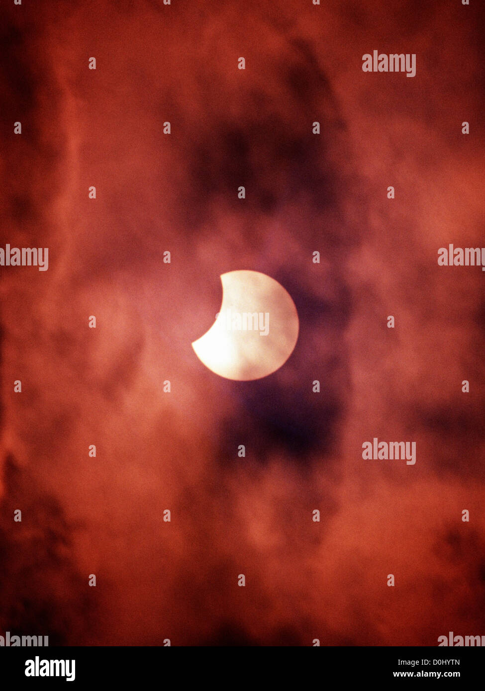 Cloud Covering Partial Solar Eclipse Stock Photo - Alamy