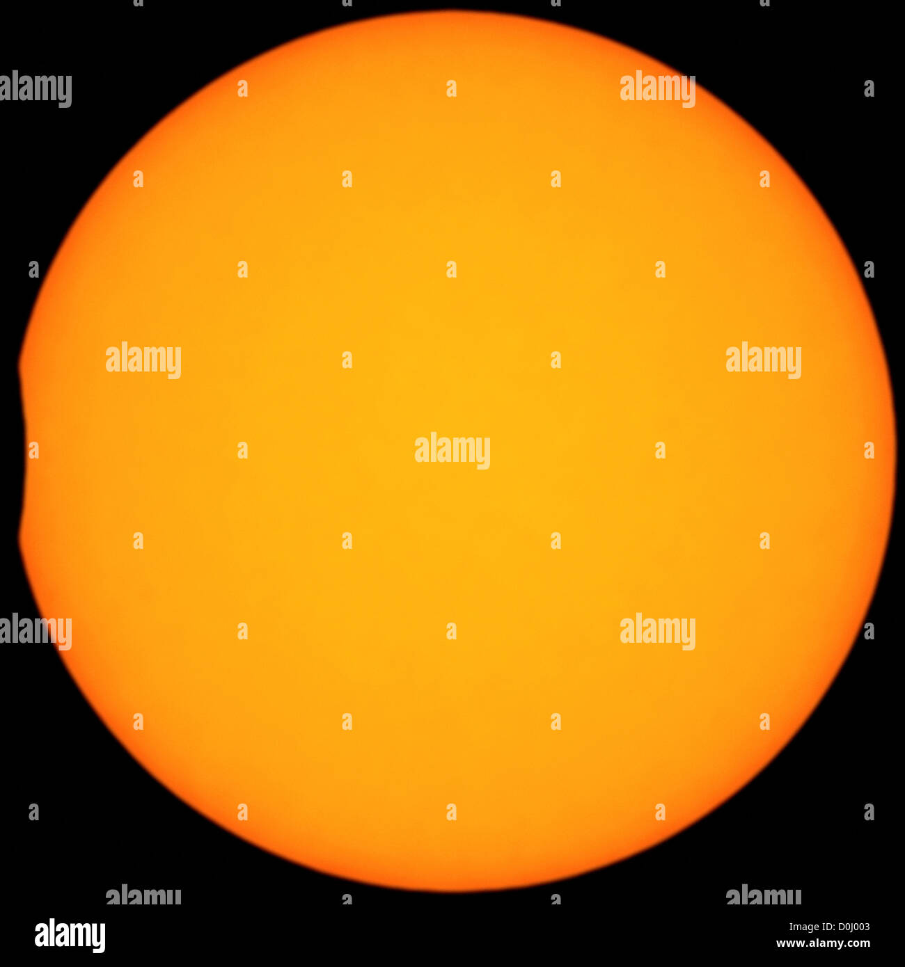 Beginning of Solar Eclipse Stock Photo - Alamy