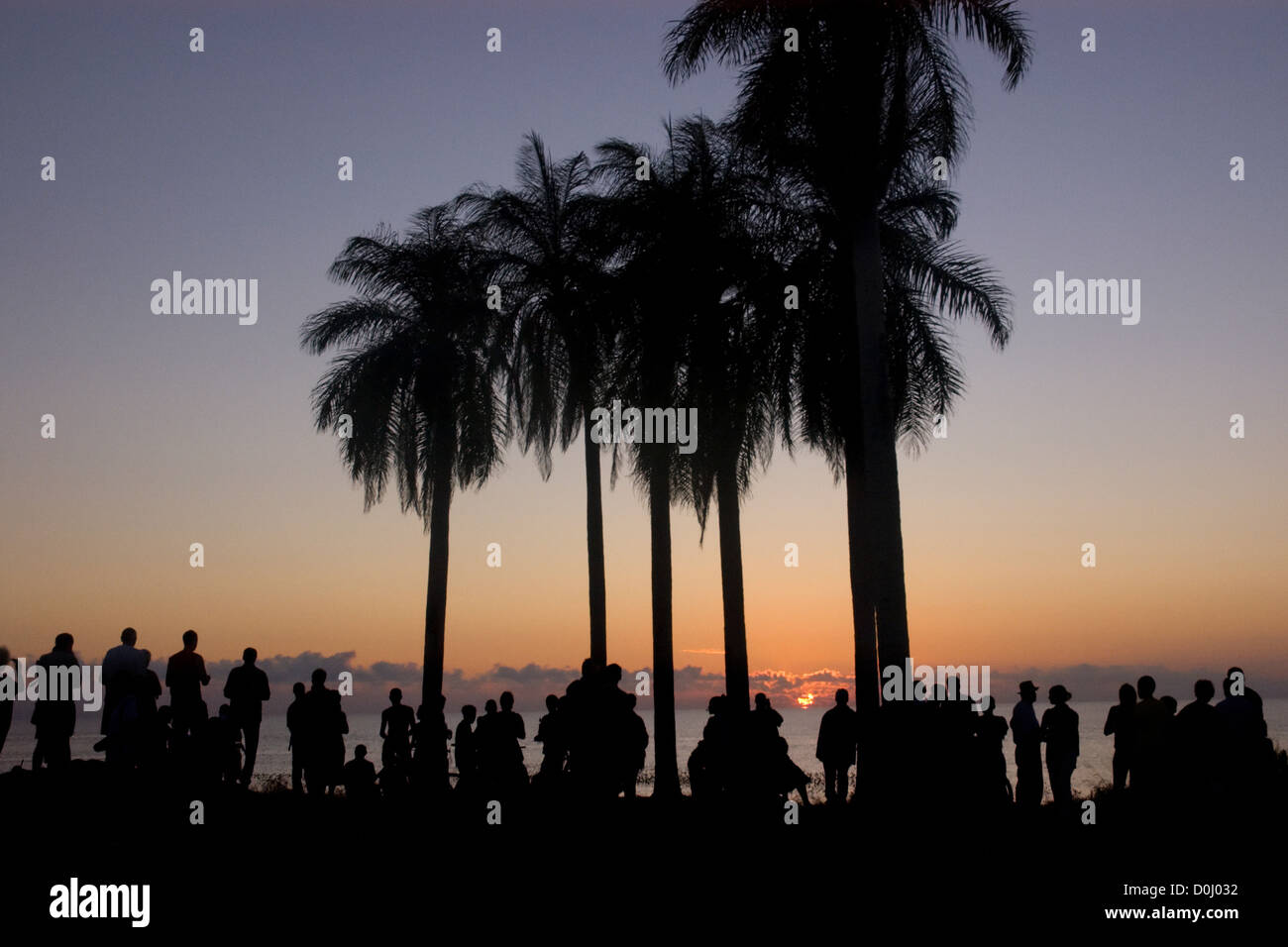 Watching Solar Eclipse at Sunset Stock Photo - Alamy