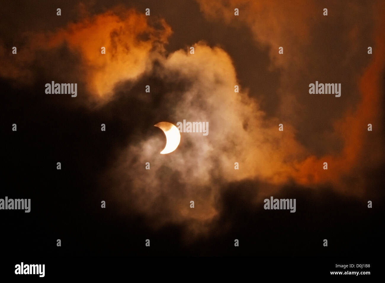 Clouds obscure a partial solar eclipse, seen from Givatayim Observatory ...