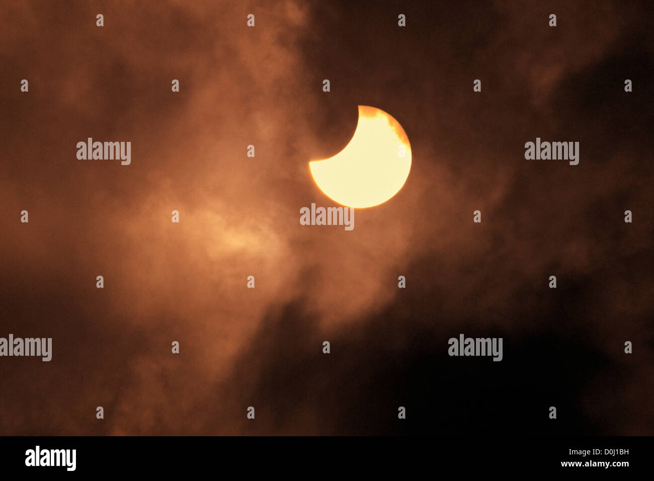 Clouds obscure a partial solar eclipse, seen from Givatayim Observatory ...