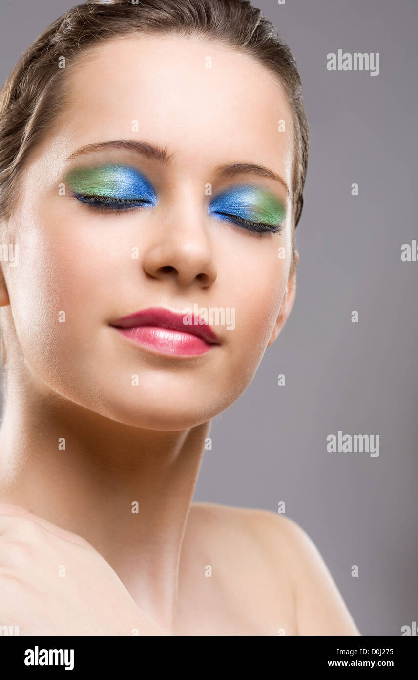 Elegant dreamy beauty in colorful special makeup Stock Photo - Alamy