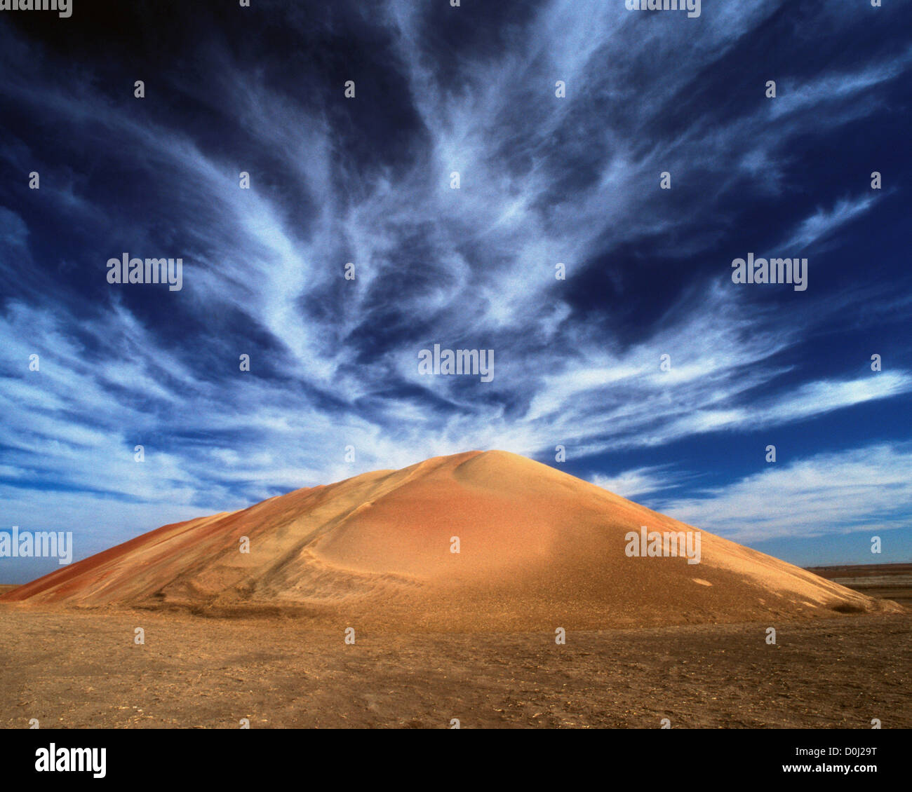 Cirrus Clouds Over a Man-Made Sand Dune Stock Photo - Alamy