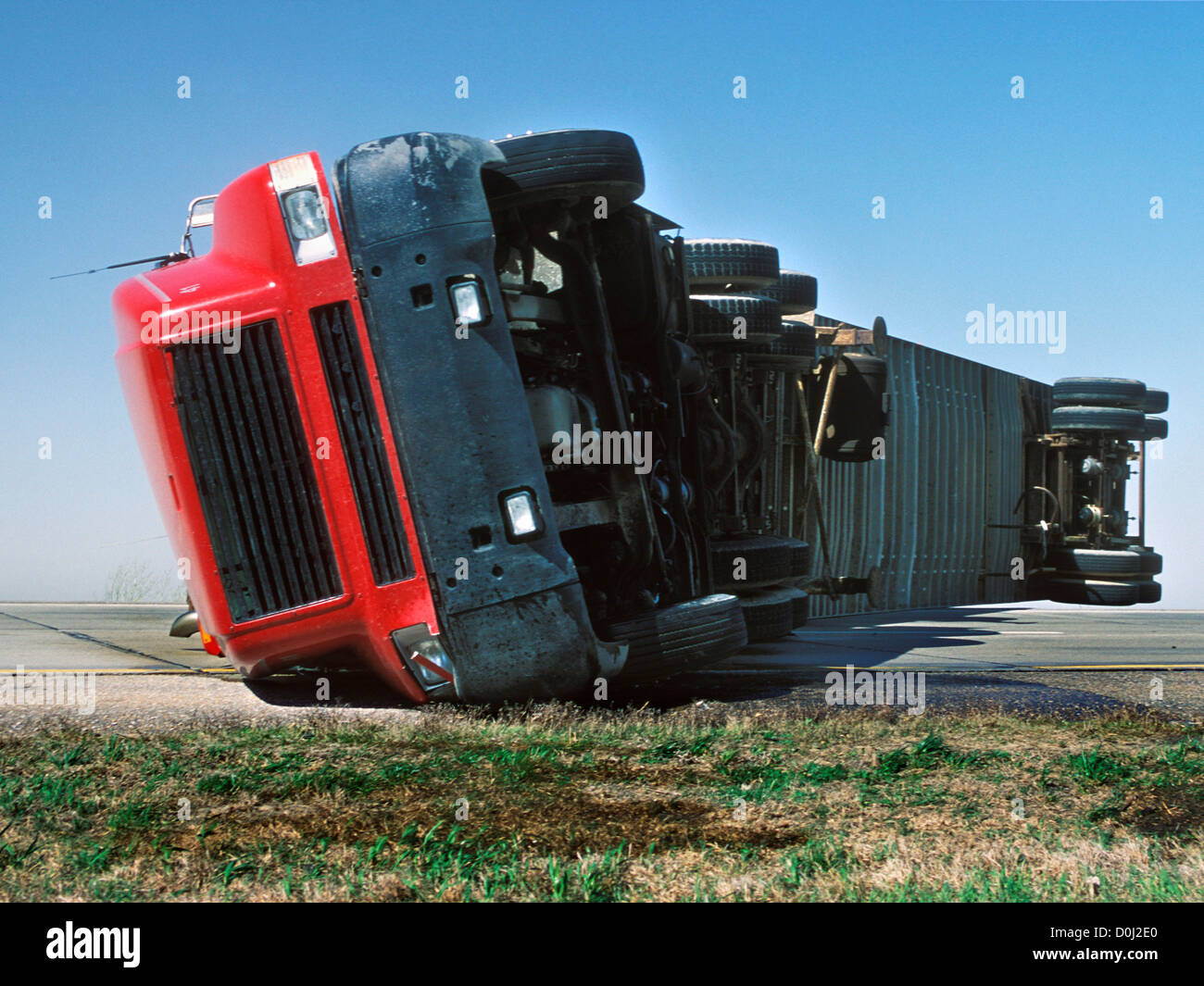 A Semi Truck is Flipped Over by Straight-Line Winds Stock Photo - Alamy