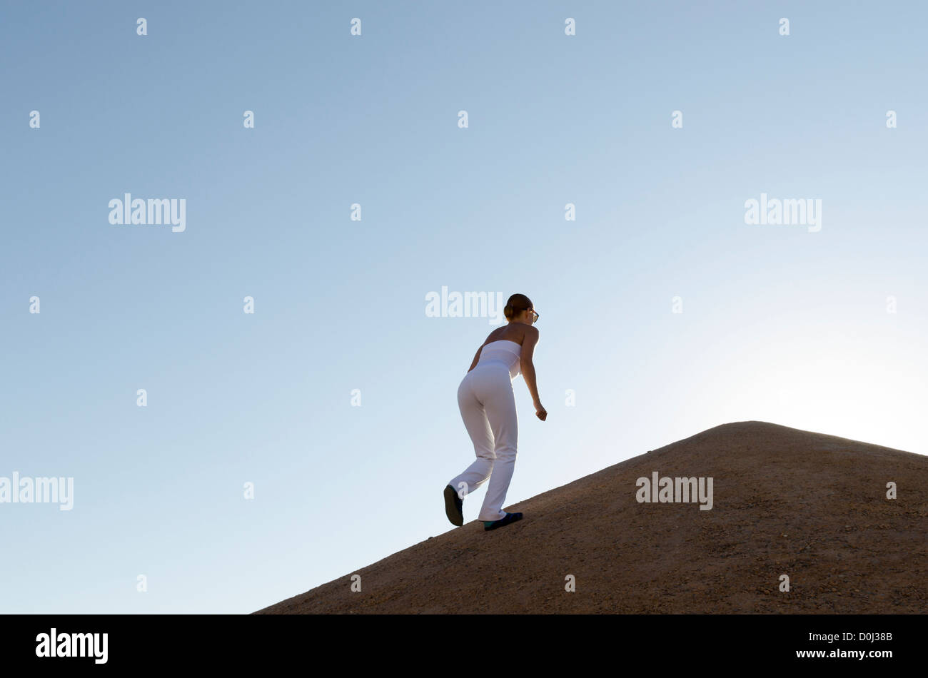 woman pyramid up slope hill desert sun going climbing ascend Stock ...