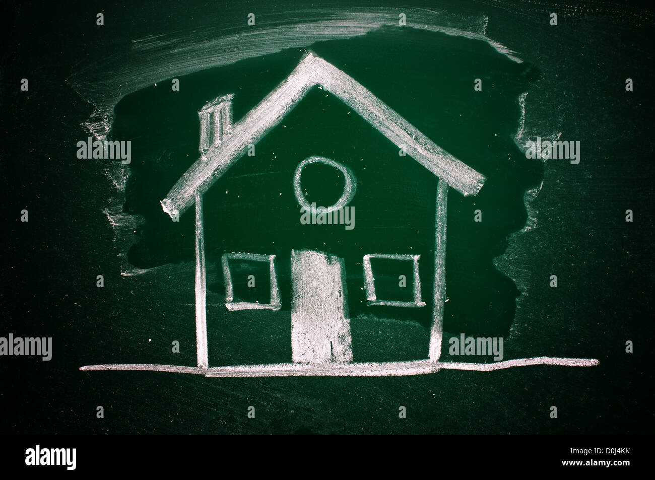 Drawing of a house on a green chalkboard Stock Photo - Alamy