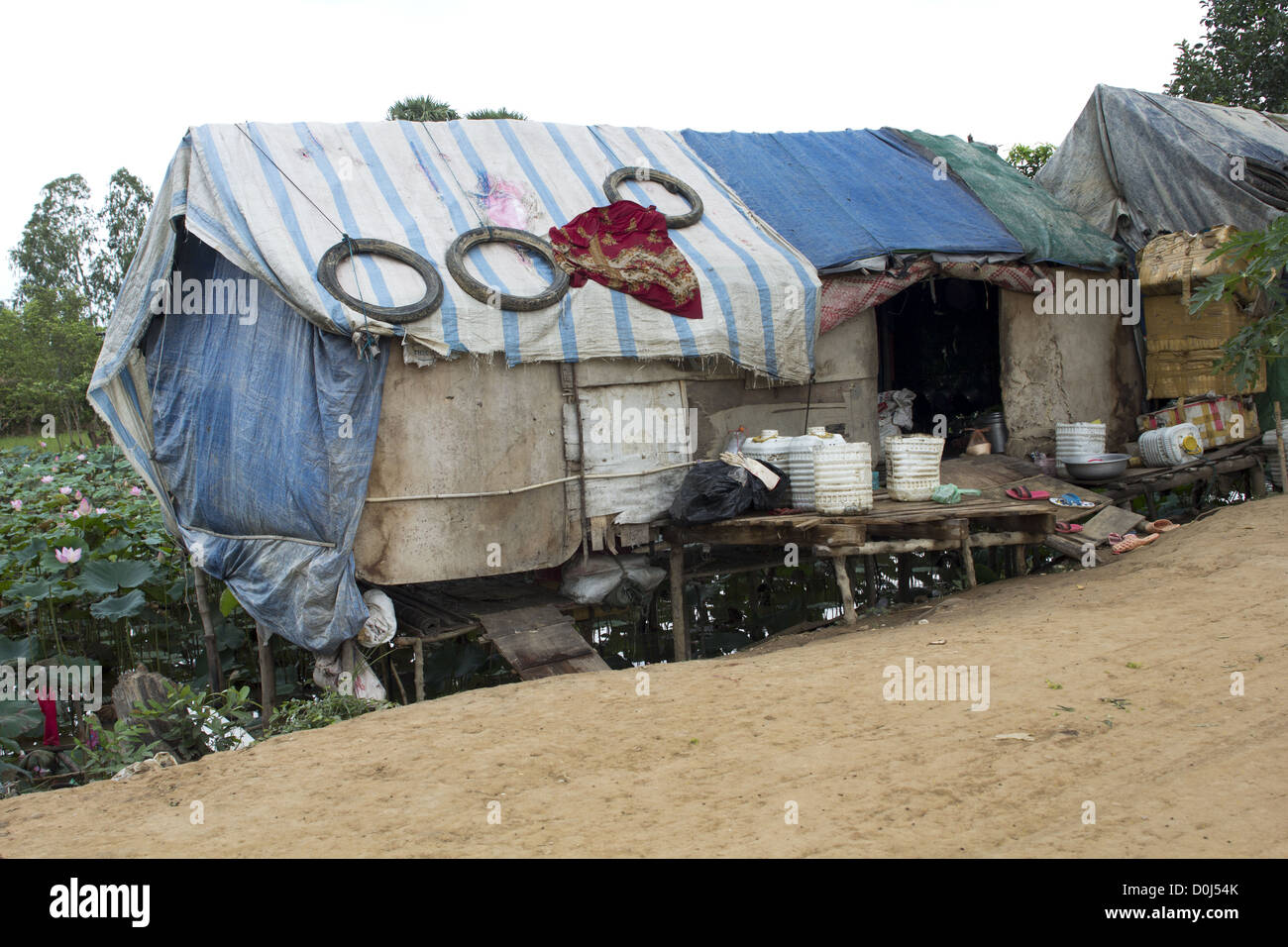 Very poor slum house, 11 people live in it Stock Photo - Alamy