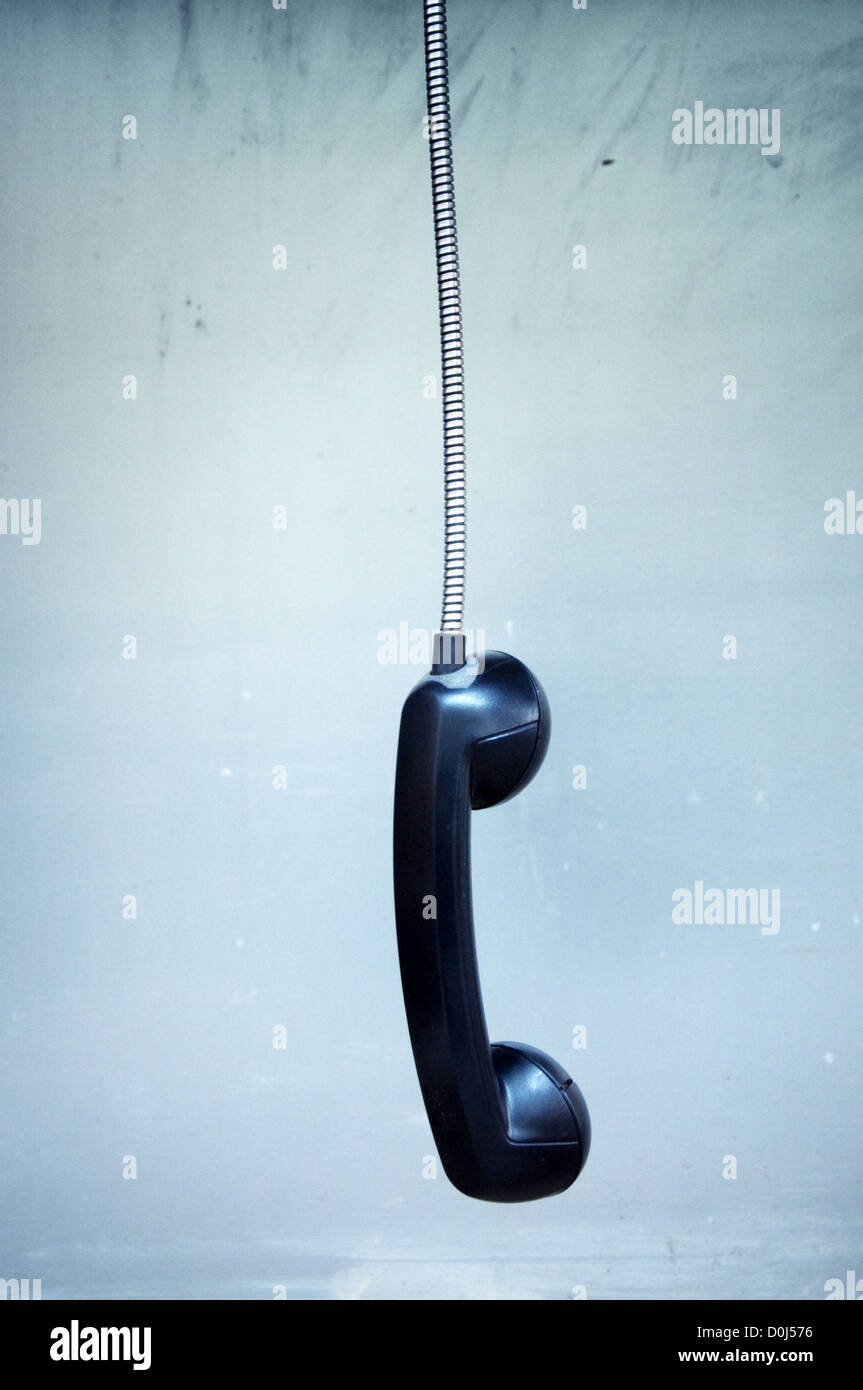 Old telephone receiver hanging hi-res stock photography and images - Alamy