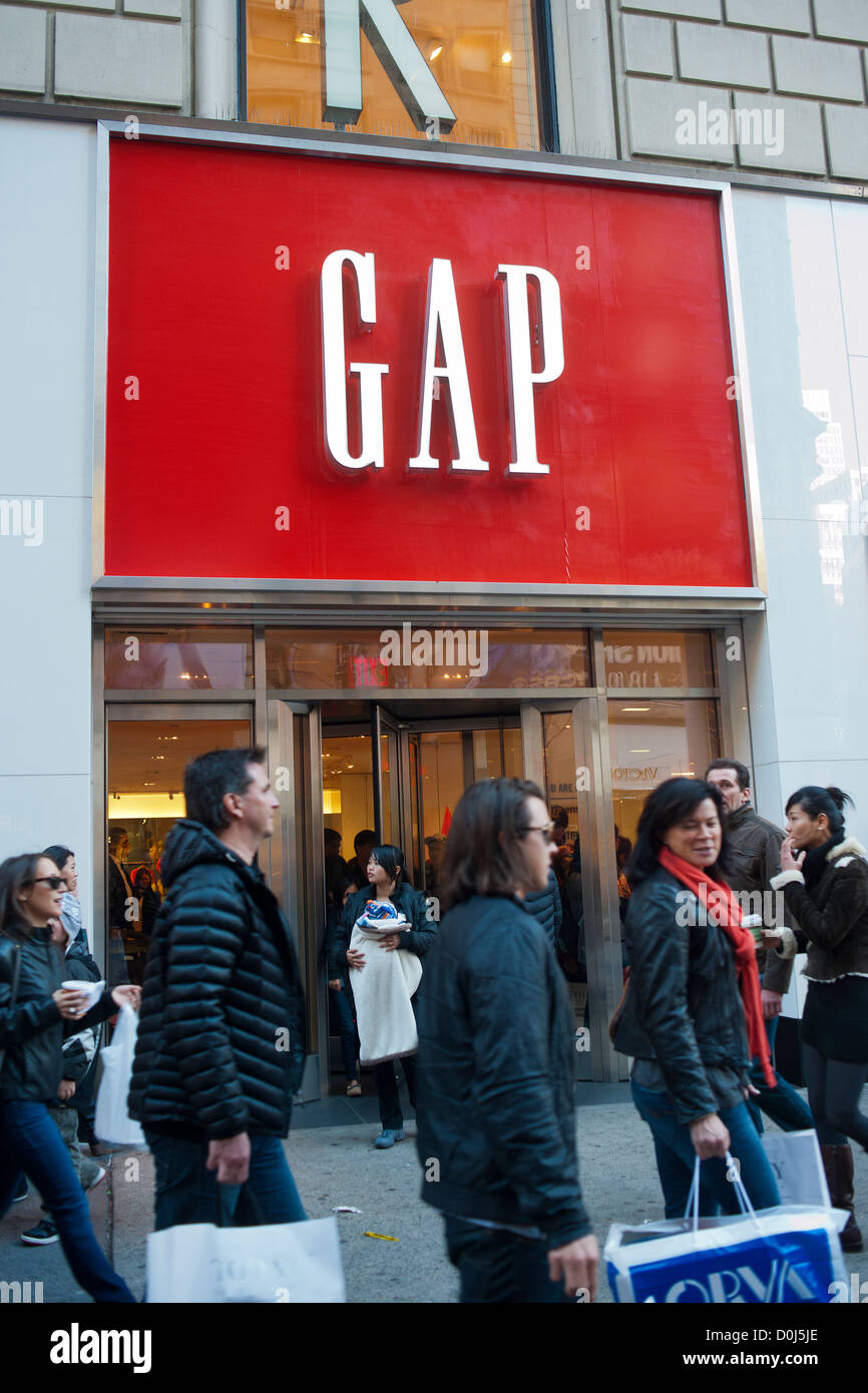 Shoppers outside a Gap store in the Herald Square shopping district in ...
