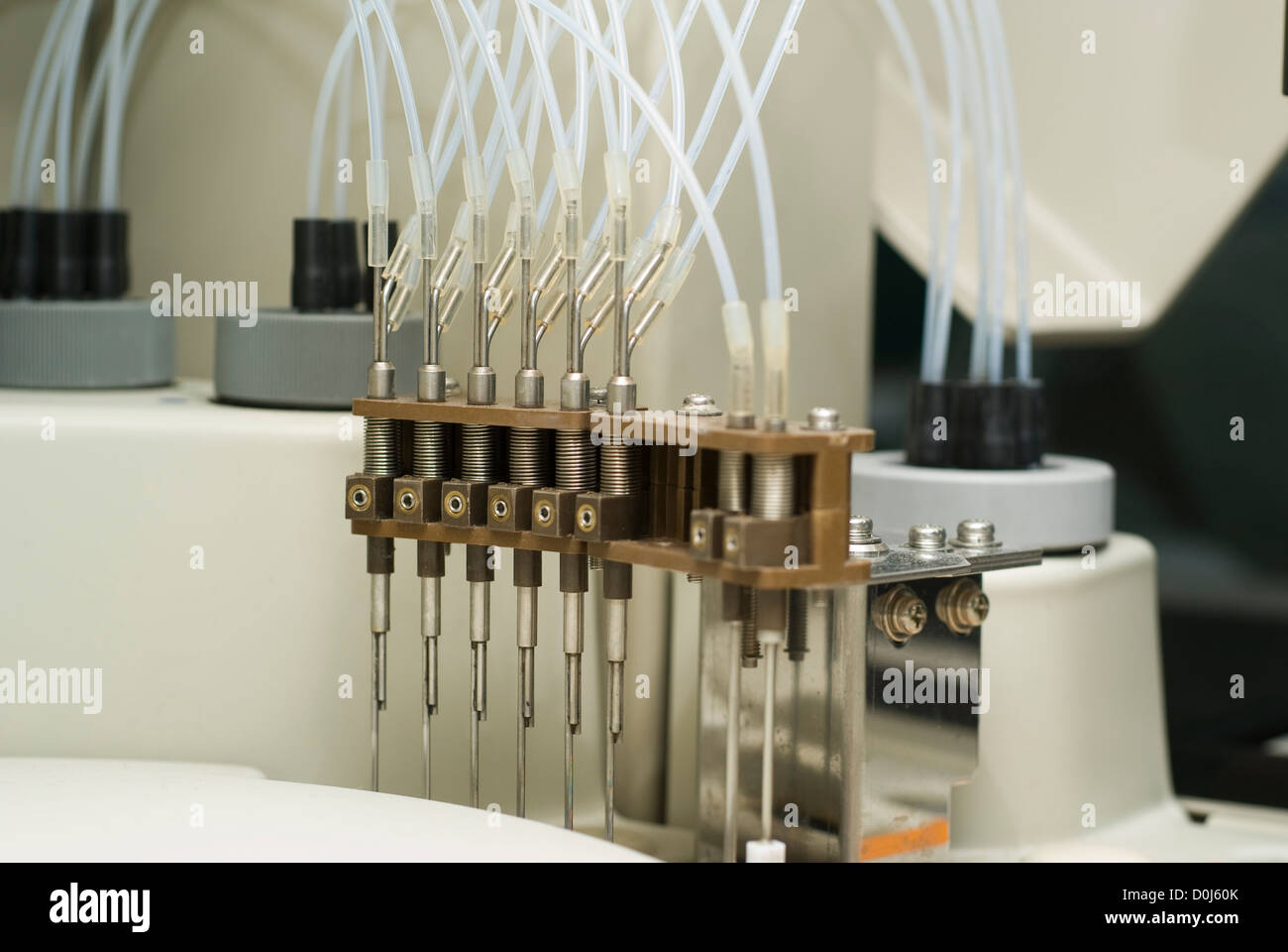needle of biochemical analyzer at work Stock Photo - Alamy