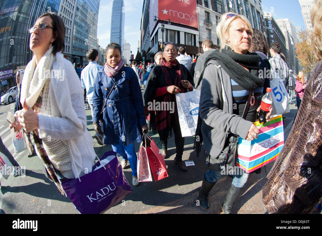 Shoppers in the Herald Square shopping district in New York looking for bargains on Black Friday ...