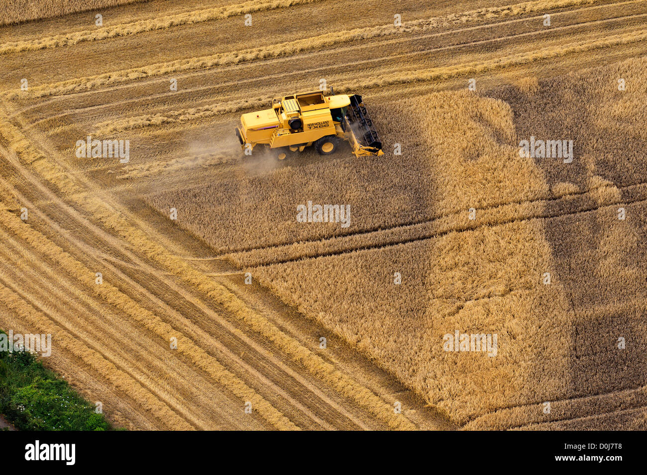 Aerial view of a combine harvester at work Stock Photo - Alamy