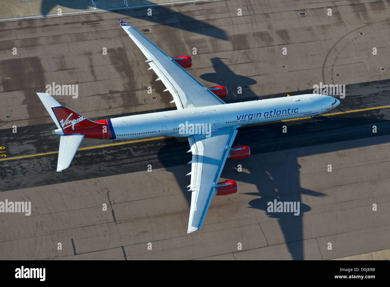 Aerial view of a Virgin Atlantic Airbus A340 taxiing at London Heathrow ...