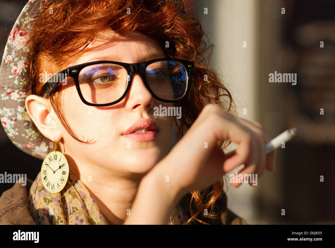 Smoking that sad cigarette thinking of someone Stock Photo - Alamy