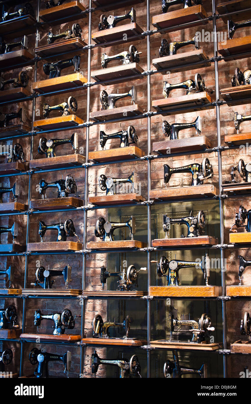 Wall of old sewing machines as a shop display,NY Stock Photo - Alamy