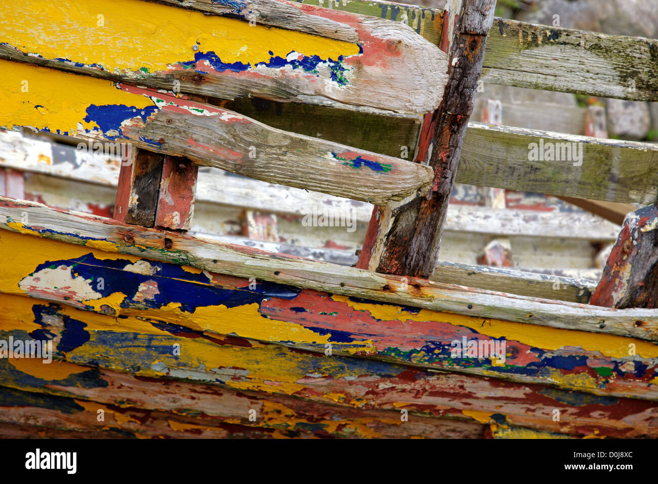 Detail of an old fishing boat rotting in the small harbour at Barna ...