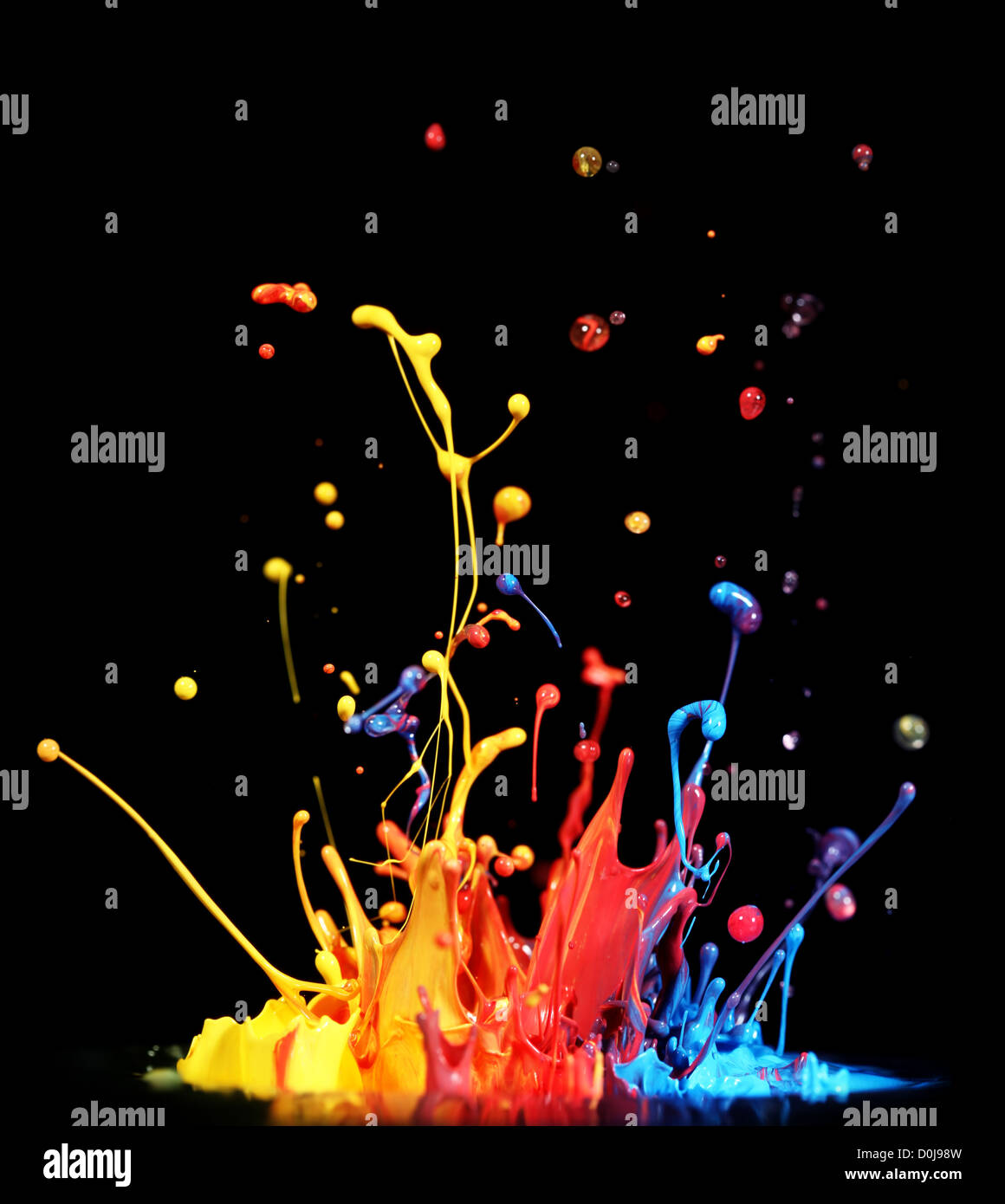 Colorful paint splashing Stock Photo - Alamy