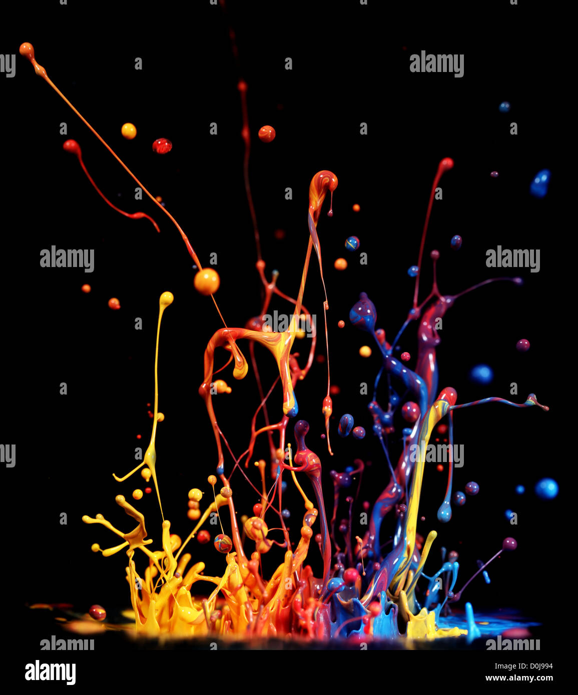 Colorful paint splashing Stock Photo - Alamy